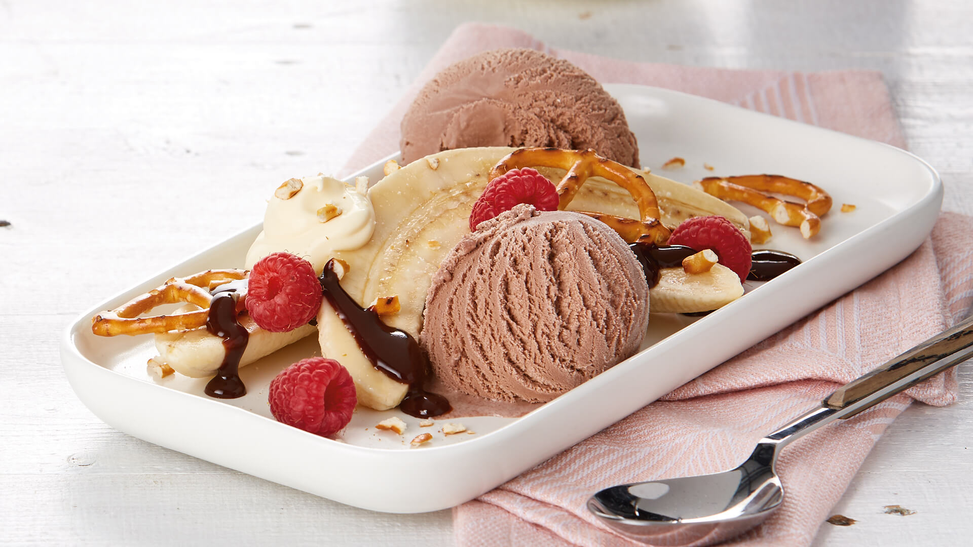 banana & raspberry split with chocolate sauce | Bulla Foodservice